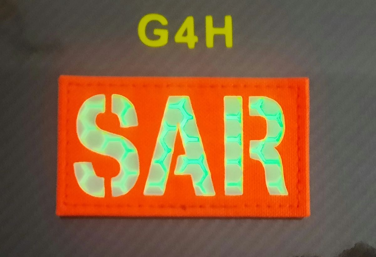 Neon orange laser cut cyflect SAR velcro patch. Perfect for SAR flight helmet